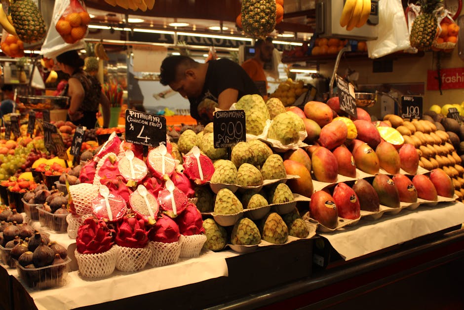 Colorful fresh fruit display at a Valencia market stall