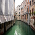 Scenic view of Venice canals lined with historic buildings and colorful facades