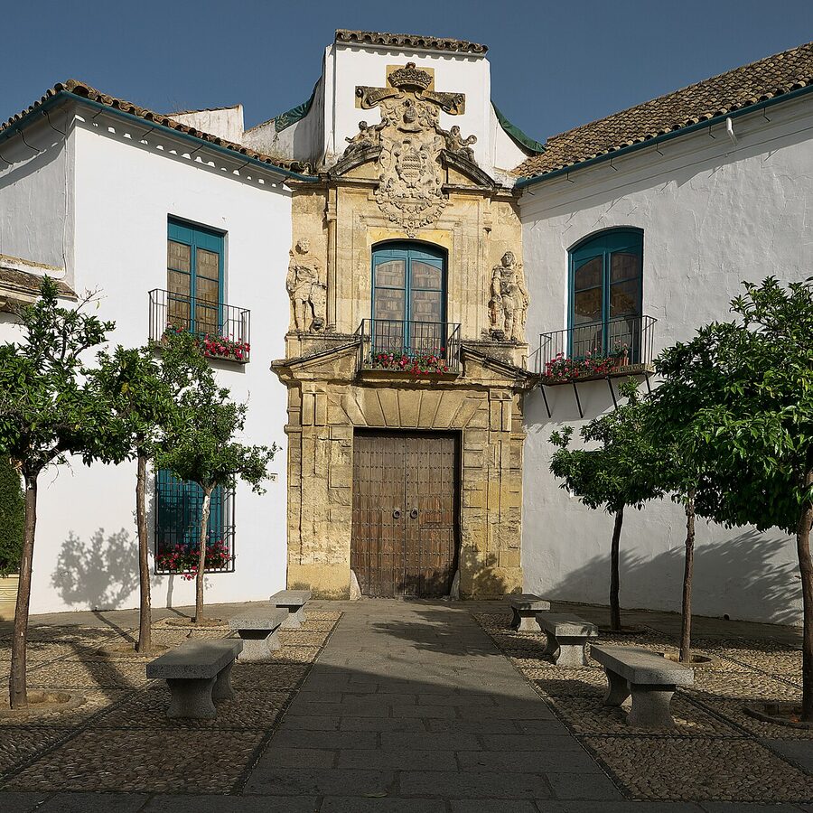 The ornate stone entrance facade of Viana Palace in Cordoba