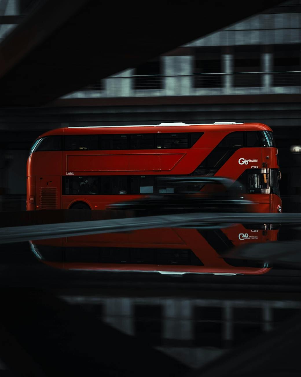Red double-decker bus on a London street
