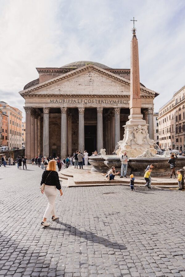 Crowds of travelers gathered in front of the Pantheon in Rome