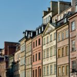 Colorful historic houses in Warsaw Old Town on sunny day
