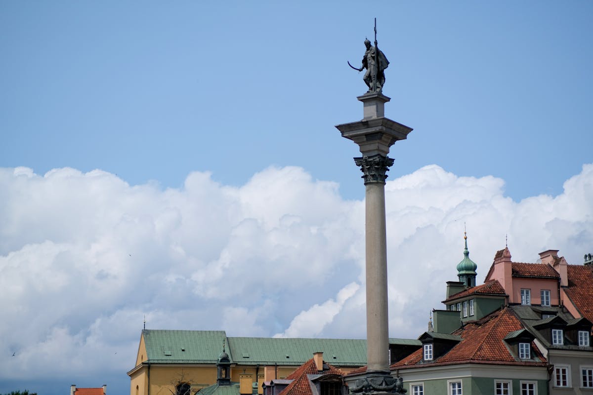 Sigismunds Column in Warsaw Old Town against blue sky