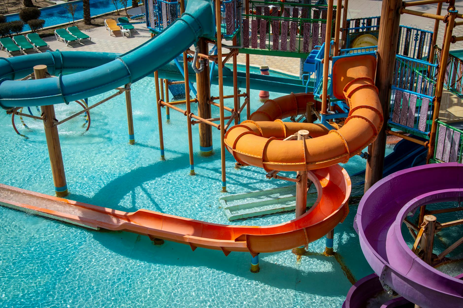 Colorful water park slides on a sunny summer day