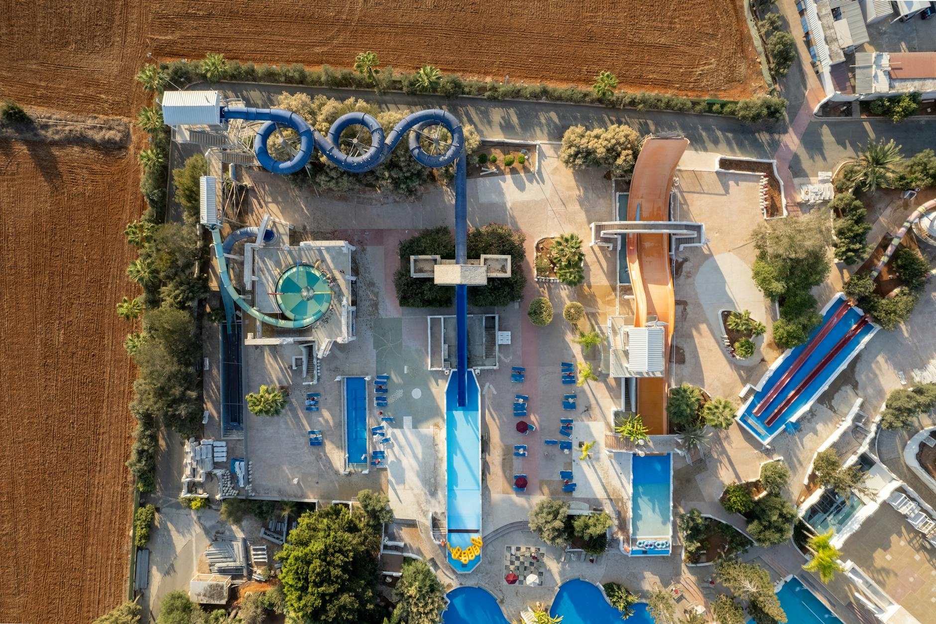 Aerial view of winding water slides at a water park