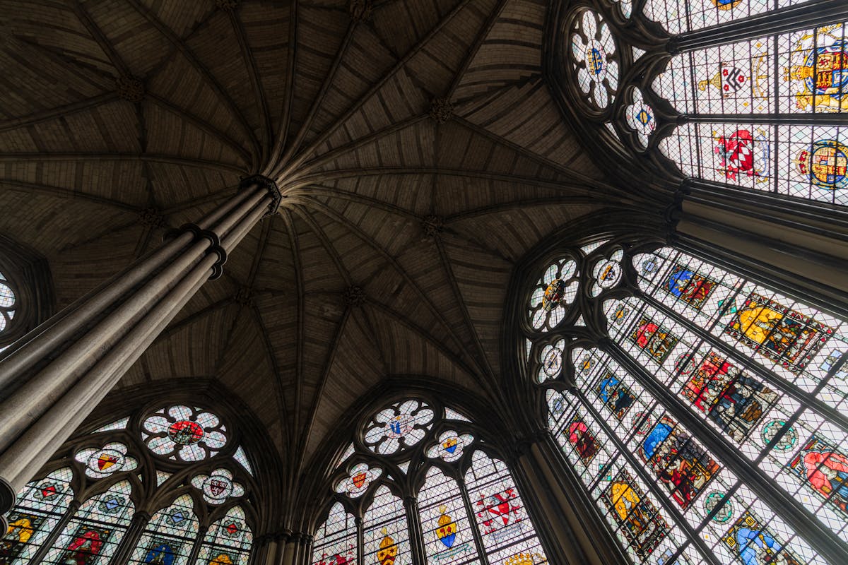 Stained glass windows inside a historic English cathedral