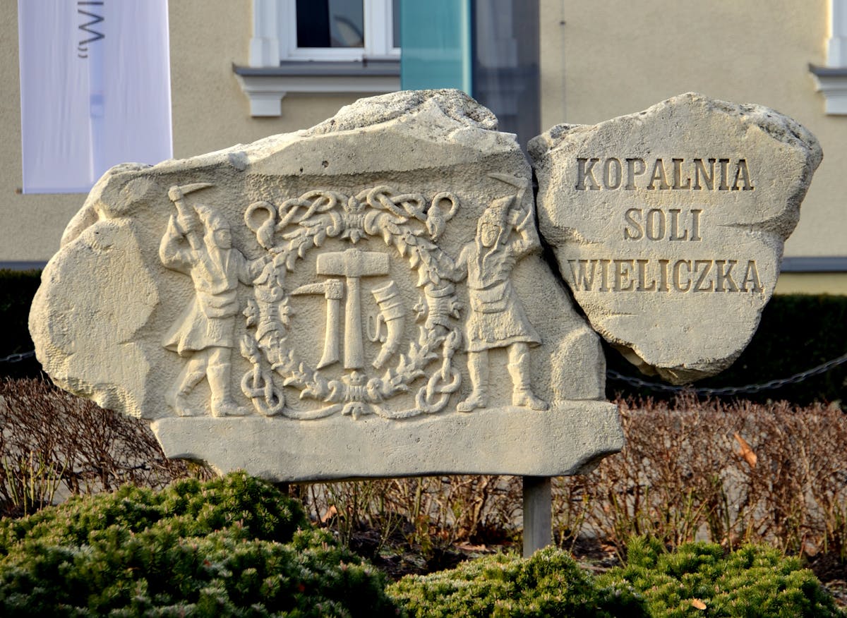 Stone sculpture at entrance of Wieliczka Salt Mine UNESCO site in Poland