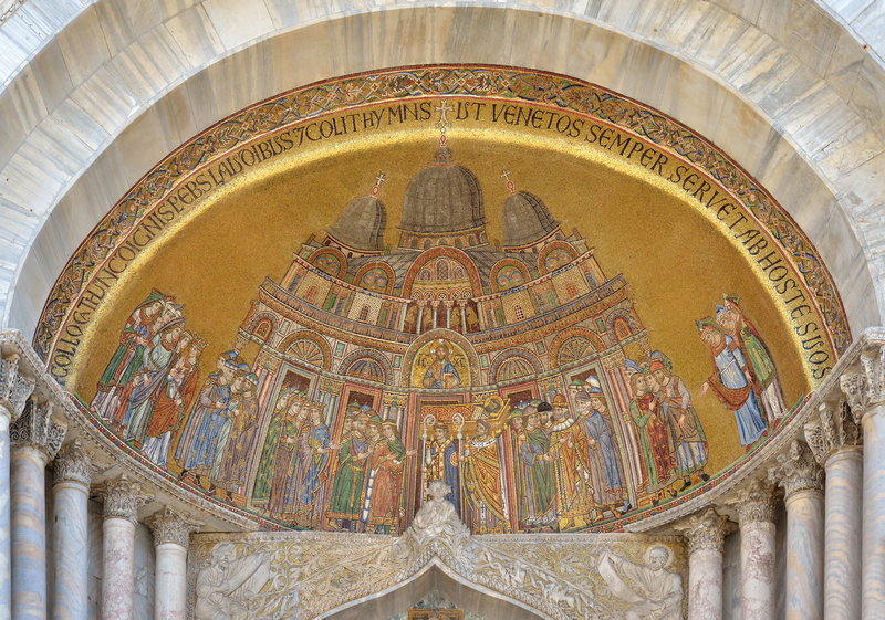 Golden mosaic showing the procession carrying St Marks body into the basilica in Venice