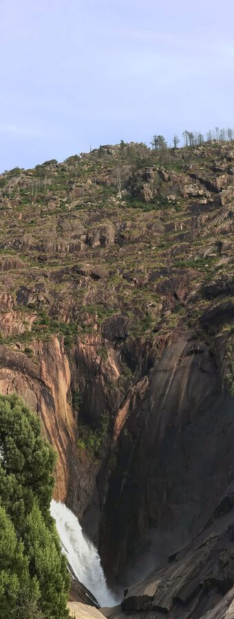 The Ezaro waterfall where the Xallas River plunges into the Atlantic Ocean in Galicia