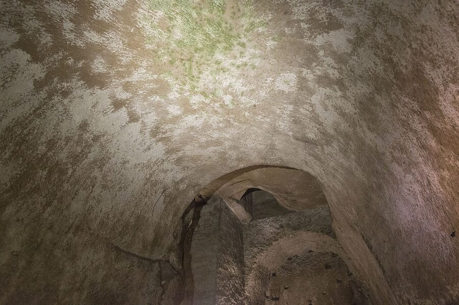 Stone carved tunnel in the Napoli Sotterranea underground network beneath Naples