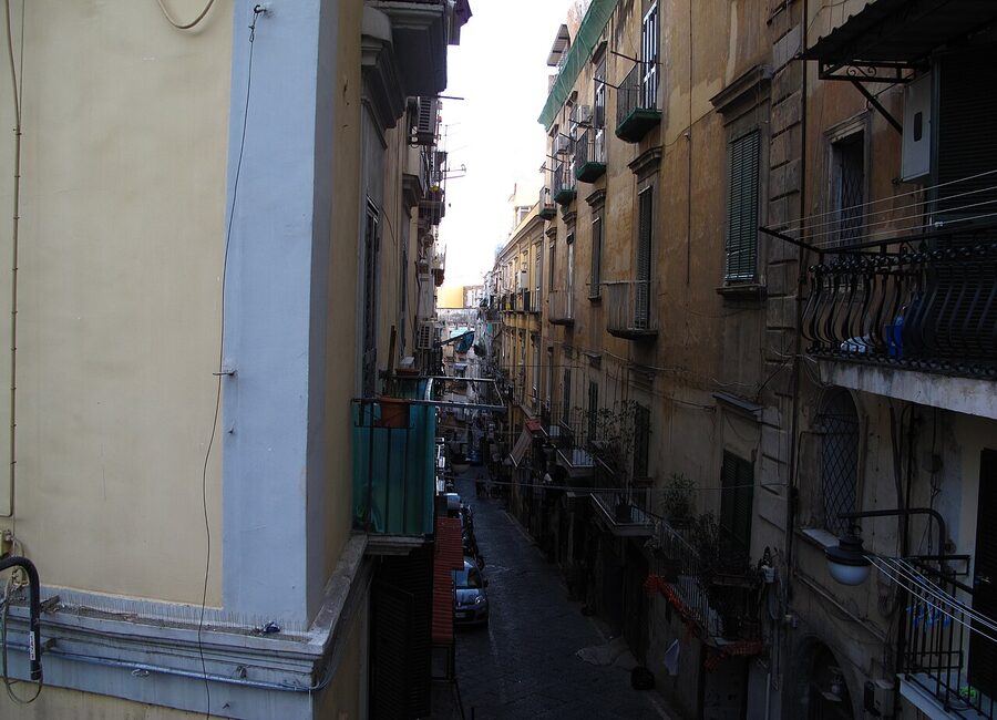 Narrow alley in the Quartieri Spagnoli neighborhood of Naples with laundry and balconies