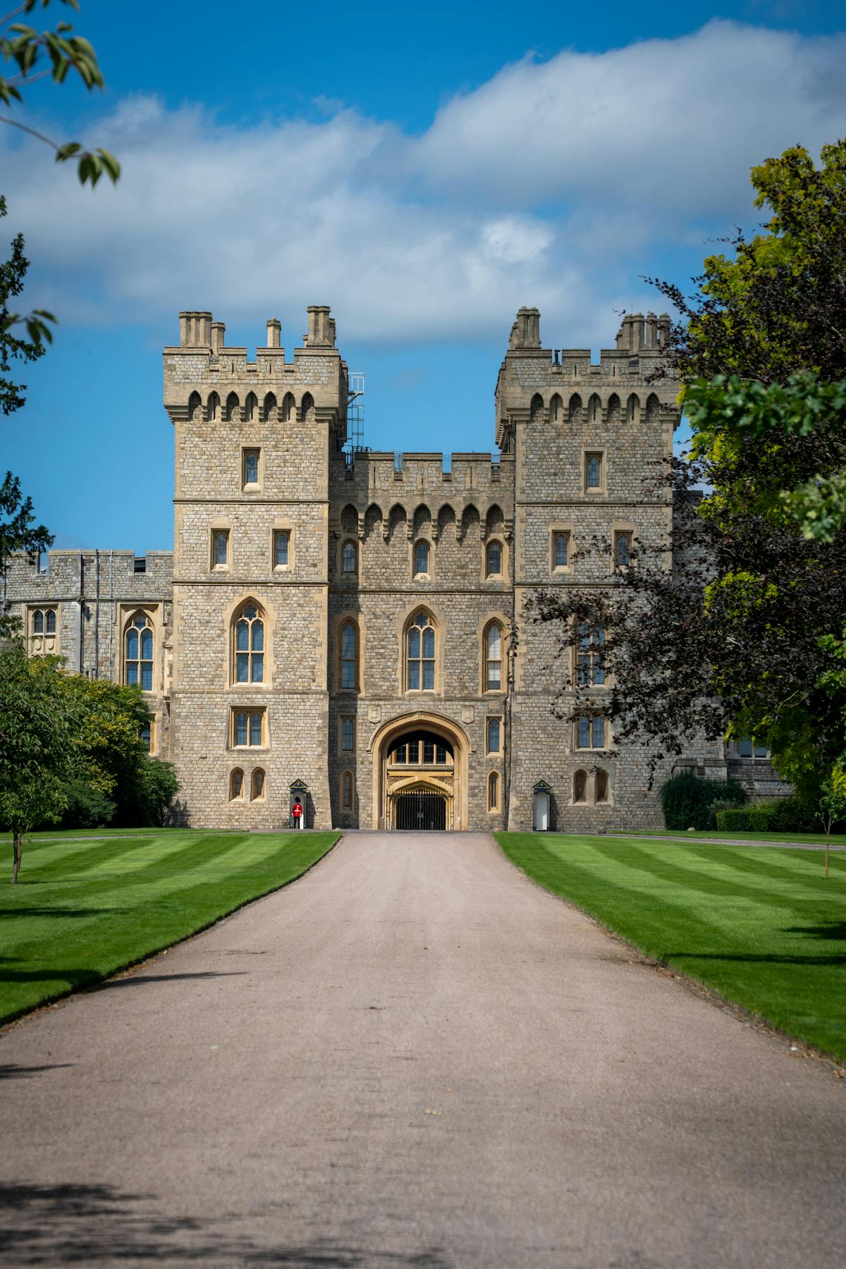 The entrance to Windsor Castle with manicured green lawns