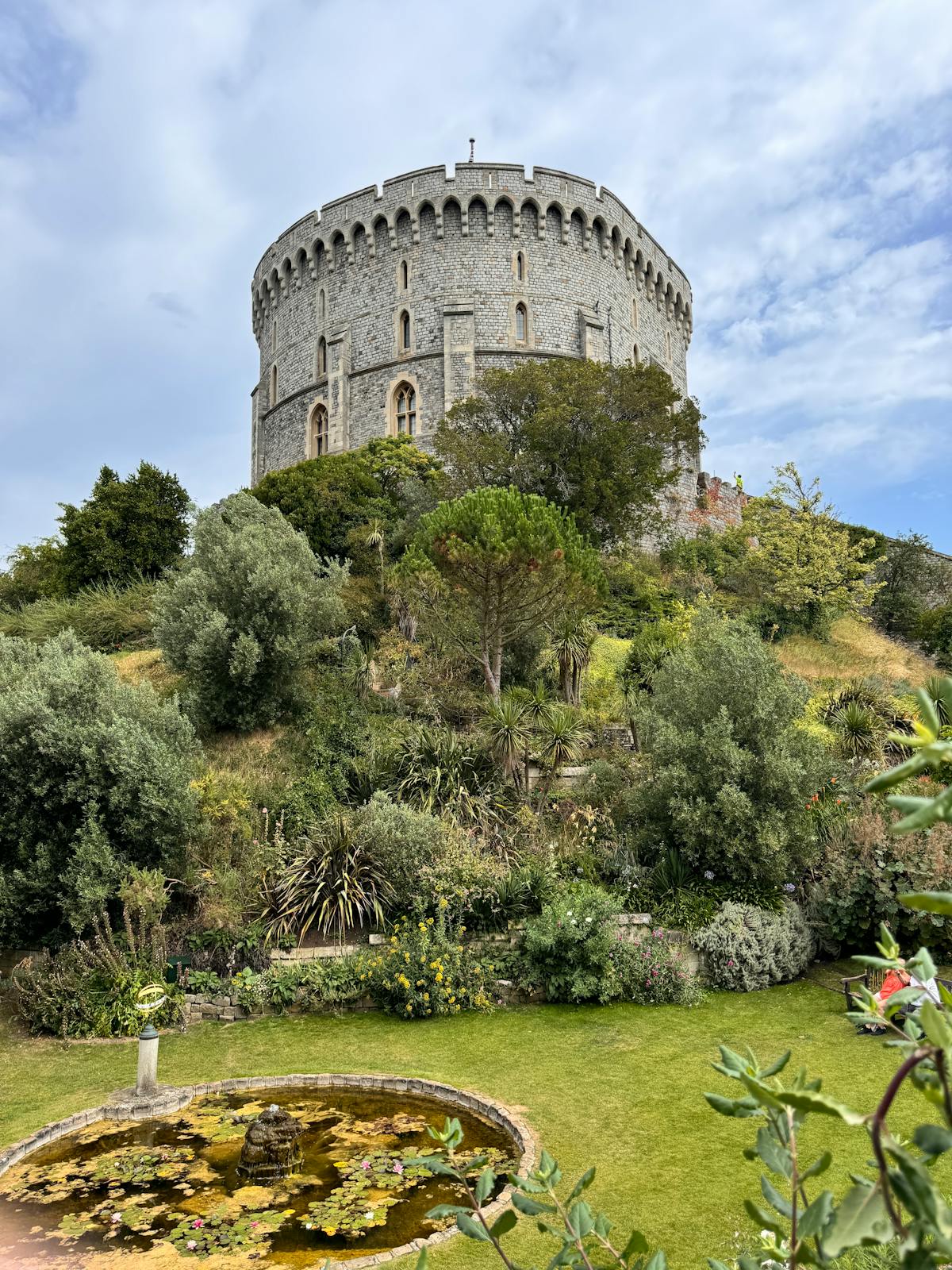 Peaceful gardens at Windsor Castle with vibrant greenery