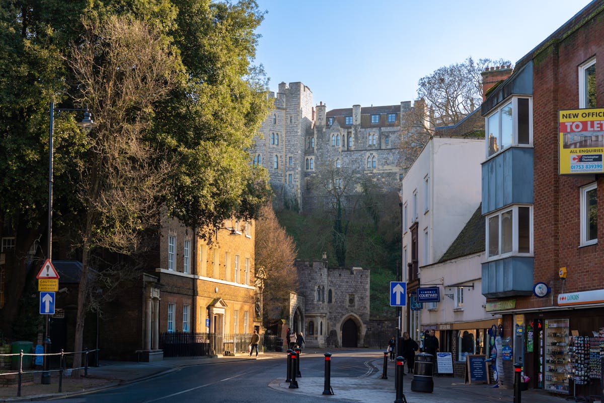 Windsor town street with the castle towering in the background