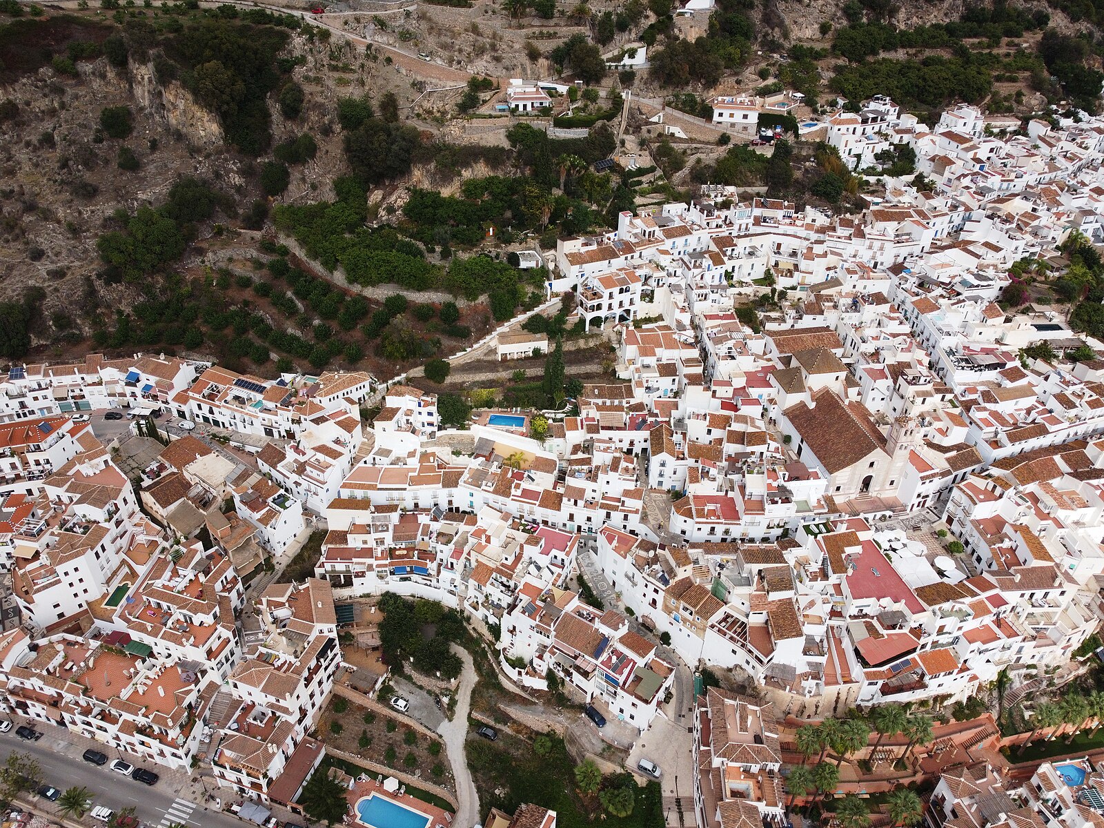 Whitewashed buildings and streets in Frigiliana village Andalusia